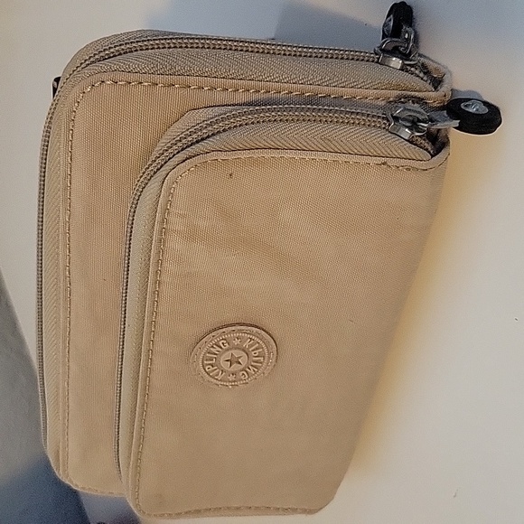 Kipling | Bags | Kipling Beige Zip Around Wallet | Poshmark